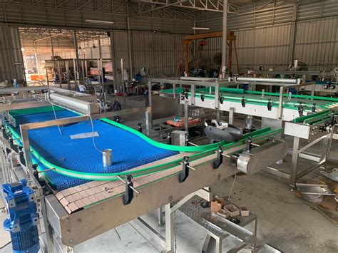 ระบบสายพานลำเลียงสินค้าขึ้น ลง รถบรรทุก