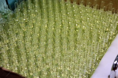 Premium Photo Sterile Capsules For Injection Bottles On The Bottling