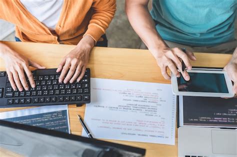 premium photo writing codes and typing data code technology