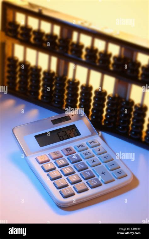 Abacus And Calculator Stock Photo Alamy