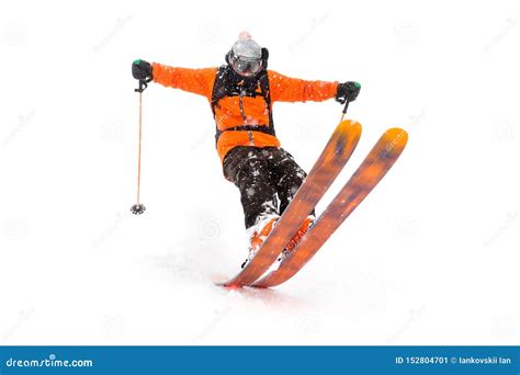 Professional Skier Athlete Rides Out Of Deep Snow While Performing A