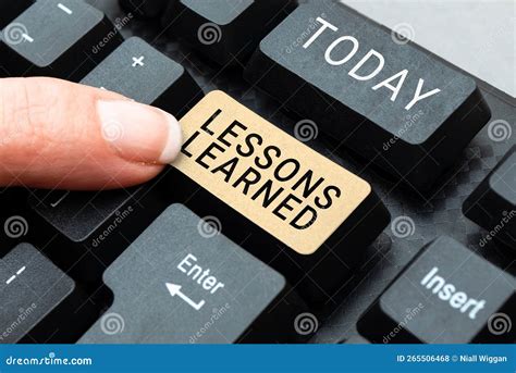 hand writing sign lessons learned word written on promote share and