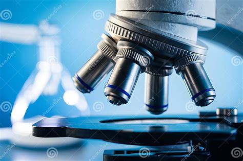 Microscope Lens Sharpens Subject With Blurred Background On Table In Lab Stock Illustration