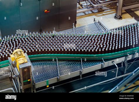 Modern Automated Beer Bottling Production Line Beer Bottles Moving On Conveyor Stock Photo Alamy