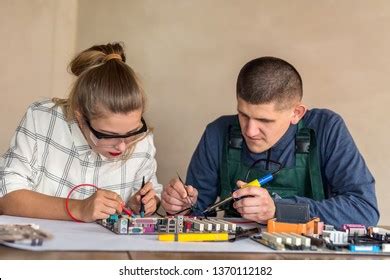 Woman Testing Motherboard Man Repairing Stock Photo Shutterstock