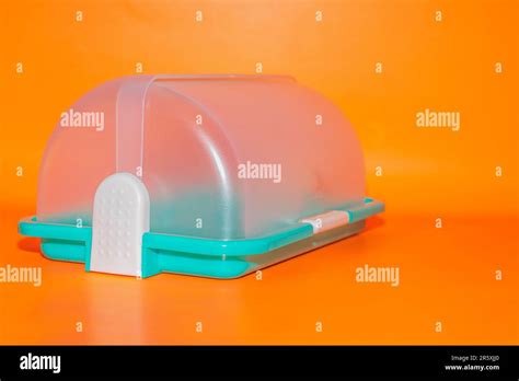 The Rectangular Cake Container With Teal Lid Is The Perfect Storage Solution For Your Delicious