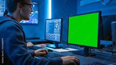 Smart Male It Programer Working On Desktop Green Mock Up Screen Computer Software Development