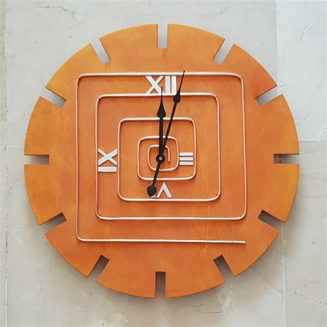 کمدا قیمت و خرید ساعت دیواری چوبی رنگ نخودی سایز قطر 50 سانتی متر و