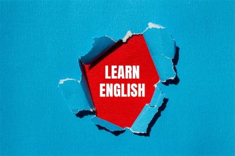 Premium Photo Learn English Message Written On Ripped Torn Blue Paper