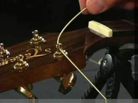 How To Restring An Acoustic Guitar Youtube