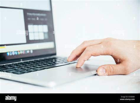 Hand Using Touchpad On Laptop Stock Photo Alamy