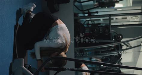 Woman Doing Exercise For Abs Muscle At The Gym Vertical Video Stock