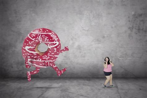 Premium Photo Sweet Donut Chasing Fat Woman