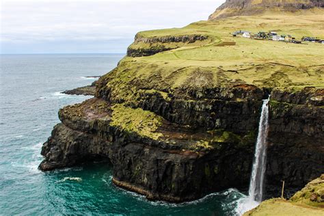 Visit The Fairytale Faroe Islands Waterfall Múlafossur Waterfall In Gásadalur Compass Twine