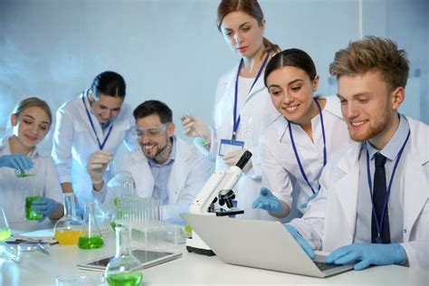 Group Of Scientists Working In Modern Laboratory Stock Image Image Of Medical Chemistry
