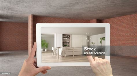 증강 현실 개념입니다 인테리어 건설 현장에서 가구와 디자인 제품을 시뮬레이션 하는 데 사용 되는 Ar 응용 프로그램과 함께 손을 잡고 태블릿 섬과 발판 현대 부엌 가구에