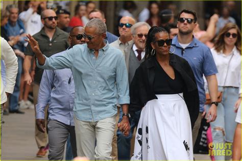 Michelle And Barack Obama Hold Hands While Exploring Barcelona With