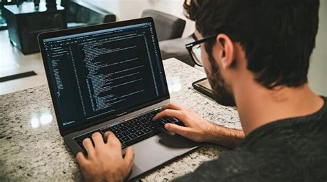 Programmer Working On Laptop Premium Ai Generated Image