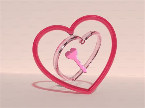 내부에 열쇠가 있는 분홍색 하트 모양의 물체 사진 Unsplash의 사랑의 상징 이미지