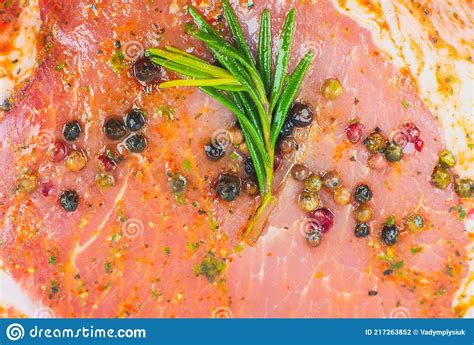 Raw Pork Meat With Spices And Green Rosemary Herb Red Meat Texture