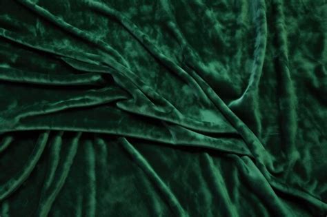 Premium Photo Deep Green Textured Velvet Under Soft Light