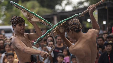 Permainan Tradisional Gasing Sejarah Cara Memainkan Dan Bentuk