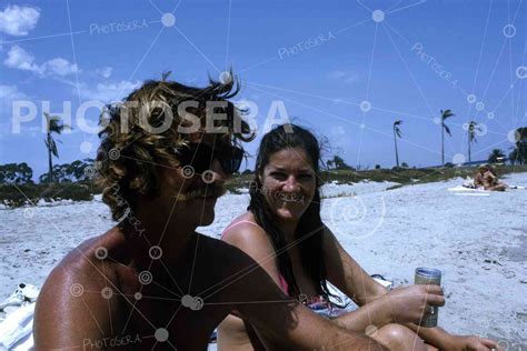 Couple Drinking Beer On The Beach Location Unknown 1973 Photosera