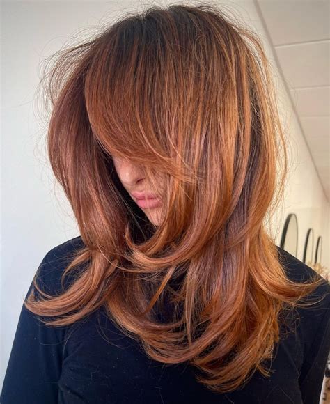 30 Best Medium Layered Haircuts With Bangs To Style In 2025