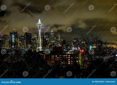 Cityscape Of Seattle The Usa With Kerry Park Under A Cloudy Sky At