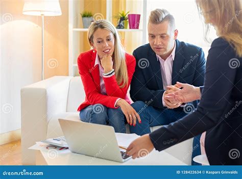 Couple Planning Their Finances Together With Professional Financial