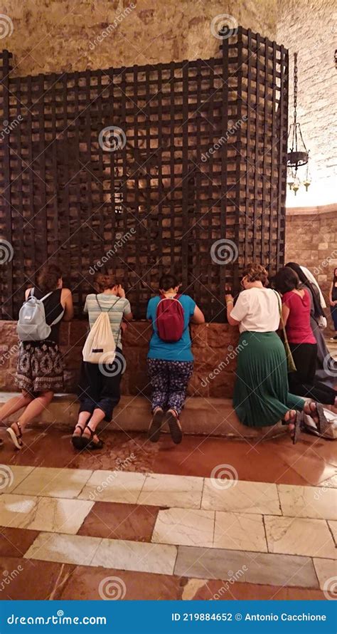 Pilgrims Praying In Front Of The Tomb Of Saint Francis In Assisi Editorial Photography Image