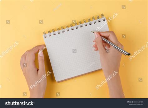 Girl Writes Open Notebook Top View Stock Photo 1124670461 Shutterstock
