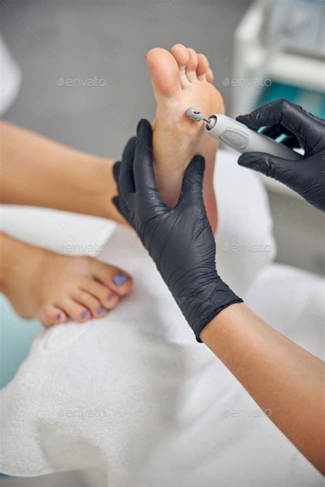 Nail Artist Doing Hardware Pedicure For Woman In 2025 Pedicure