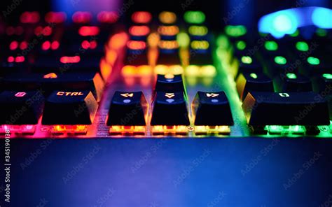 Premium Gaming RGB LED Backlit Keyboard Mostly Red Orange And Green Front View Stock Photo