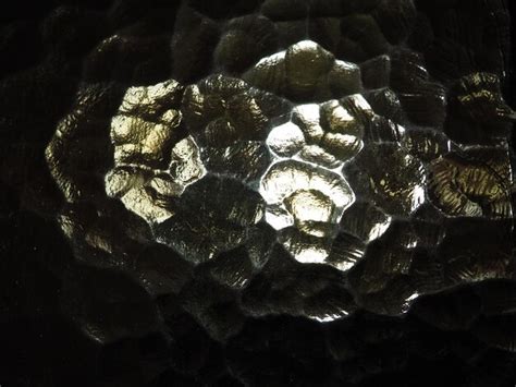 Premium Photo Corrugated Glass Rear Light Source Play Of Glare And Reflections On A