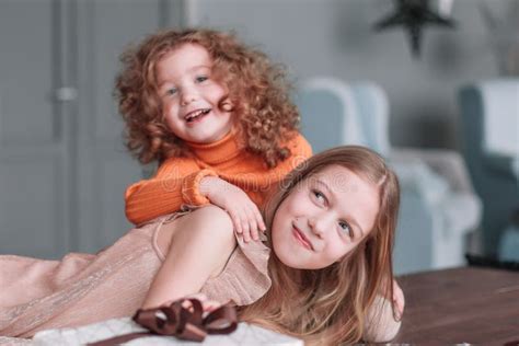 Two Pretty Sisters Having Fun On Christmas Eve Stock Image Image Of