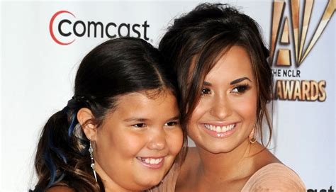 Demi Lovato Cheers On Sister Madison De La Garza At Her High School