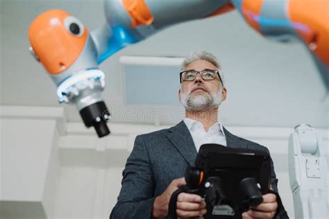 Automation Robotics Engineer Working On Robotic Knee Replacement