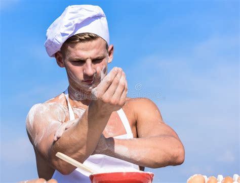 Cook Or Chef With Muscular Shoulders And Chest Covered With Flour Chef
