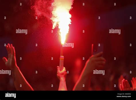 Details With The Hands Of A Man Holding A Torch Inside During A