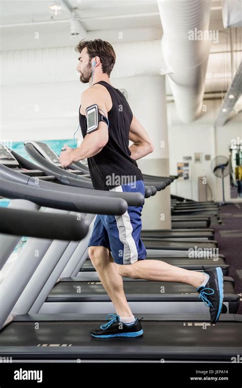 Man Running On Treadmill Stock Photo Alamy