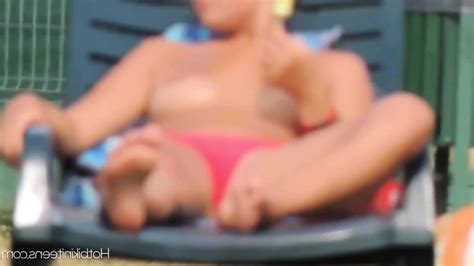 Sexy Topless Babes Tanning At The Pool Sexy Topless Babes Tanning At The Pool