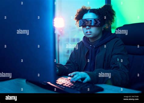 Computer Hacker Cyberpunk And Neon Girl Hacking Software Online