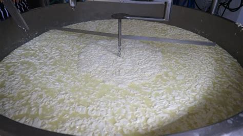 Slow Motion Of The Process Of Separating Curds From Whey During Making