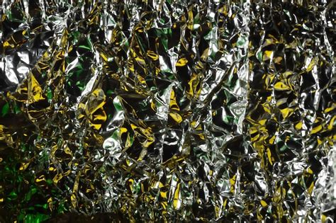 Premium Photo Glare Surface Crumpled Gold Foil Crinkled Background