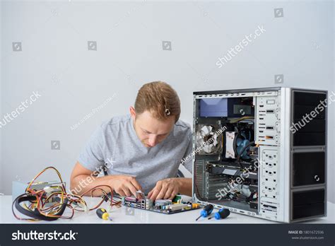 Man Fixing Computer Stock Photo 1801672936 Shutterstock