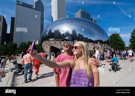 Chicago Illinois Millennium Park With Famous Cloud Gate Sculpture The Bean With Skyline In
