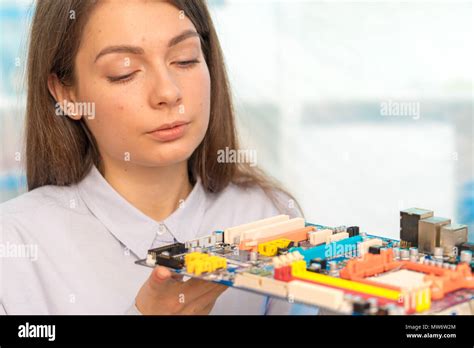 Female Babe In Electronics Class Uses A Measuring Device Stock Photo Alamy