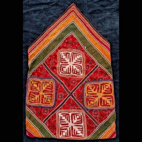 Colorful Patchwork Design On Blue Cloth