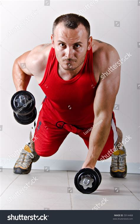 Push Up With Dumbbells Classic Endurance Exercise For Biceps Stock Push Up With Dumbbells Classic Endurance Exercise For Biceps Stock